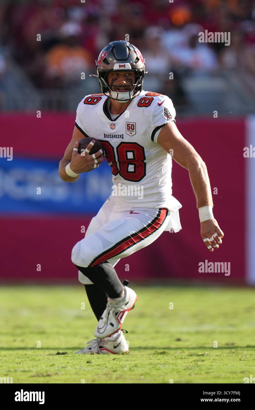 Tampa Bay Buccaneers tight end Cade Otton (88) runs after a catch ...