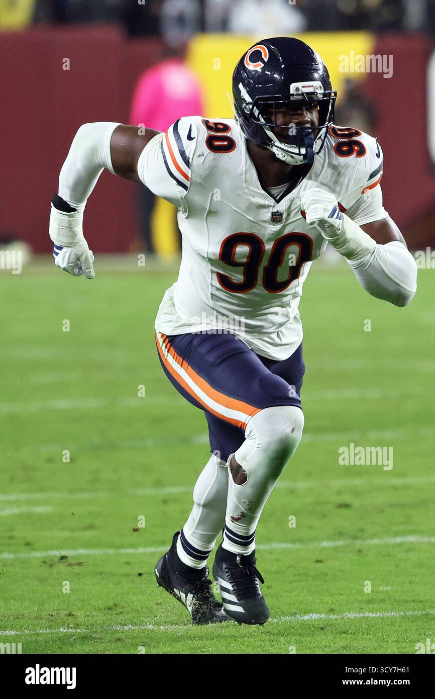 Chicago Bears defensive end Dominique Robinson (90) rushes during an ...