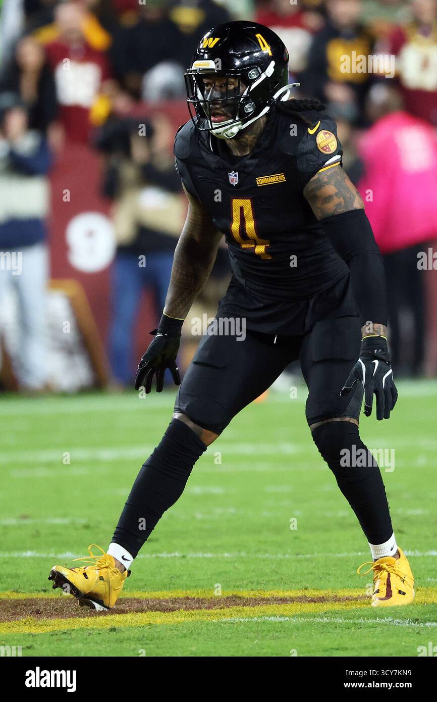 Washington Commanders linebacker Frankie Luvu (4) rushes during an NFL ...