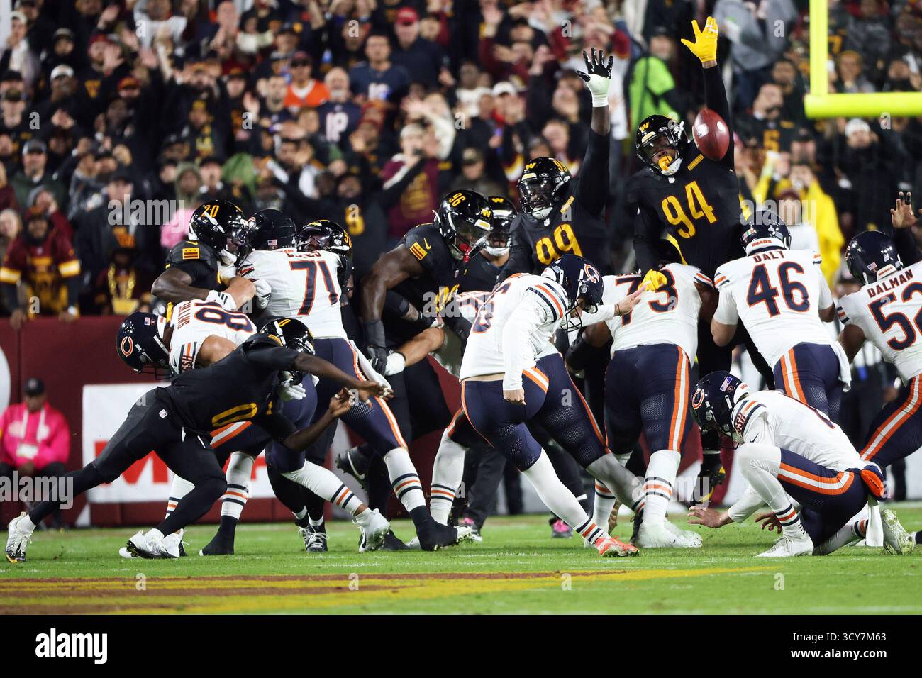 Chicago Bears kicker Jake Moody (16) kicks the ball during an NFL ...