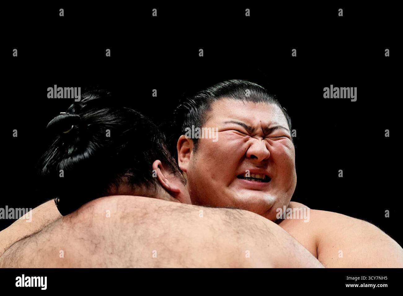 Atamifuji battles with Gonoyama in the Makuuchi Division bout on day ...