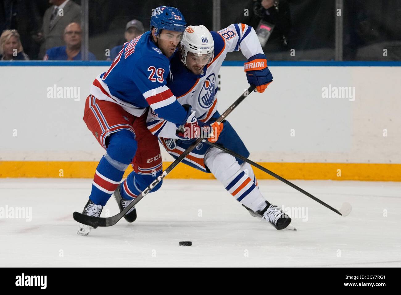 New York Rangers' Matthew Robertson (29) defends Edmonton Oilers' David ...