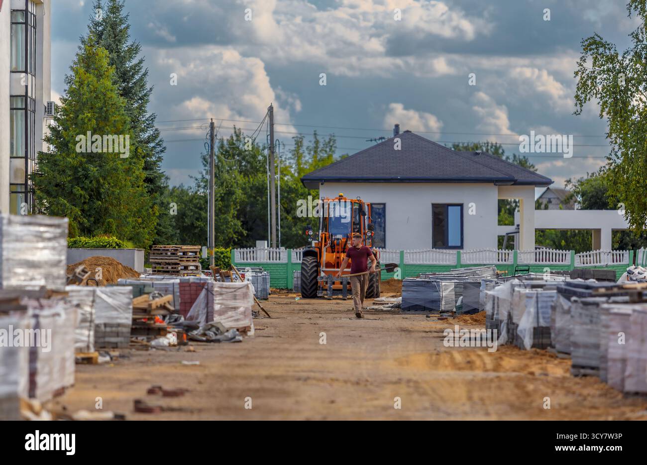 Man works near tractor in hi-res stock photography and images - Alamy