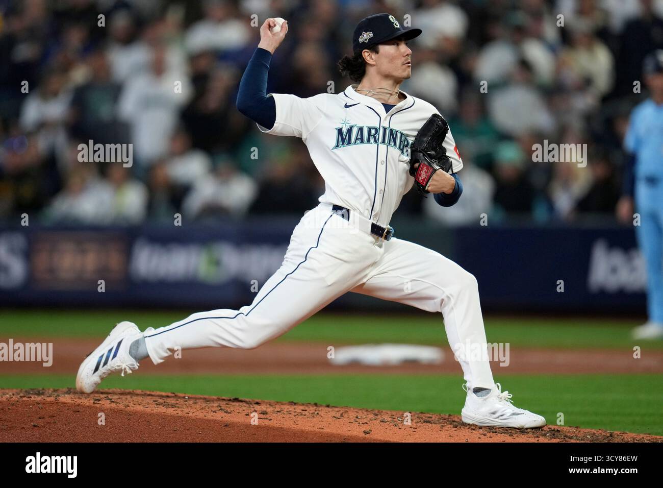 Seattle Mariners pitcher Bryan Woo throws against the Toronto Blue Jays ...