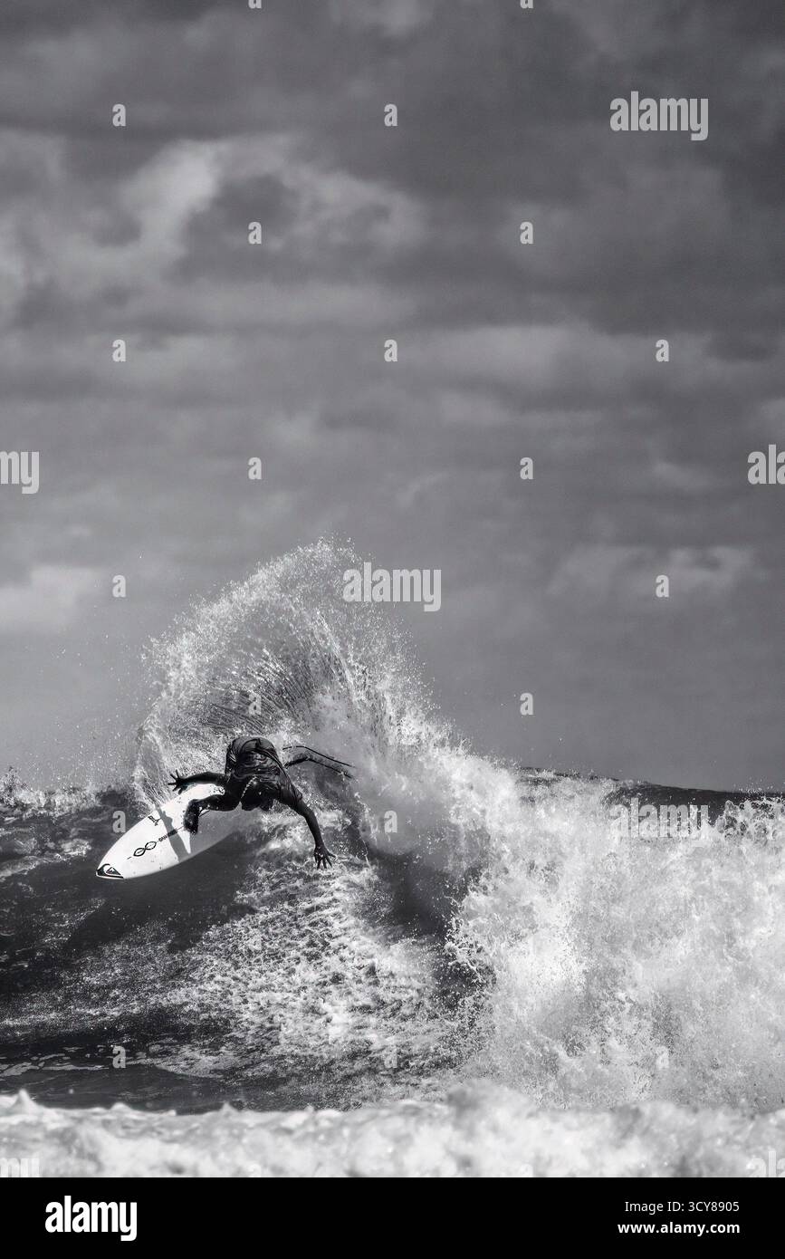 Editorial series capturing candid, high-energy surfing in dynamic ...