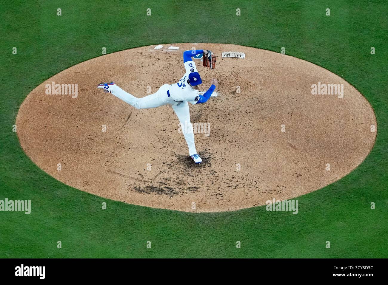 Los Angeles Dodgers pitcher Shohei Ohtani throws against the Milwaukee ...