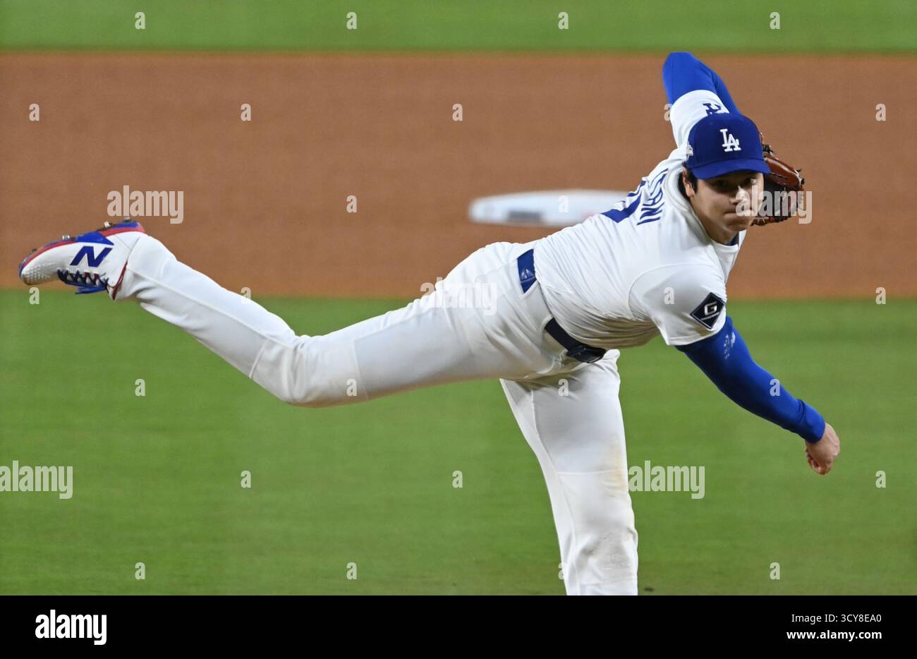 Los Angeles Dodgers starting pitcher Shohei Otani throws a pitch of ...