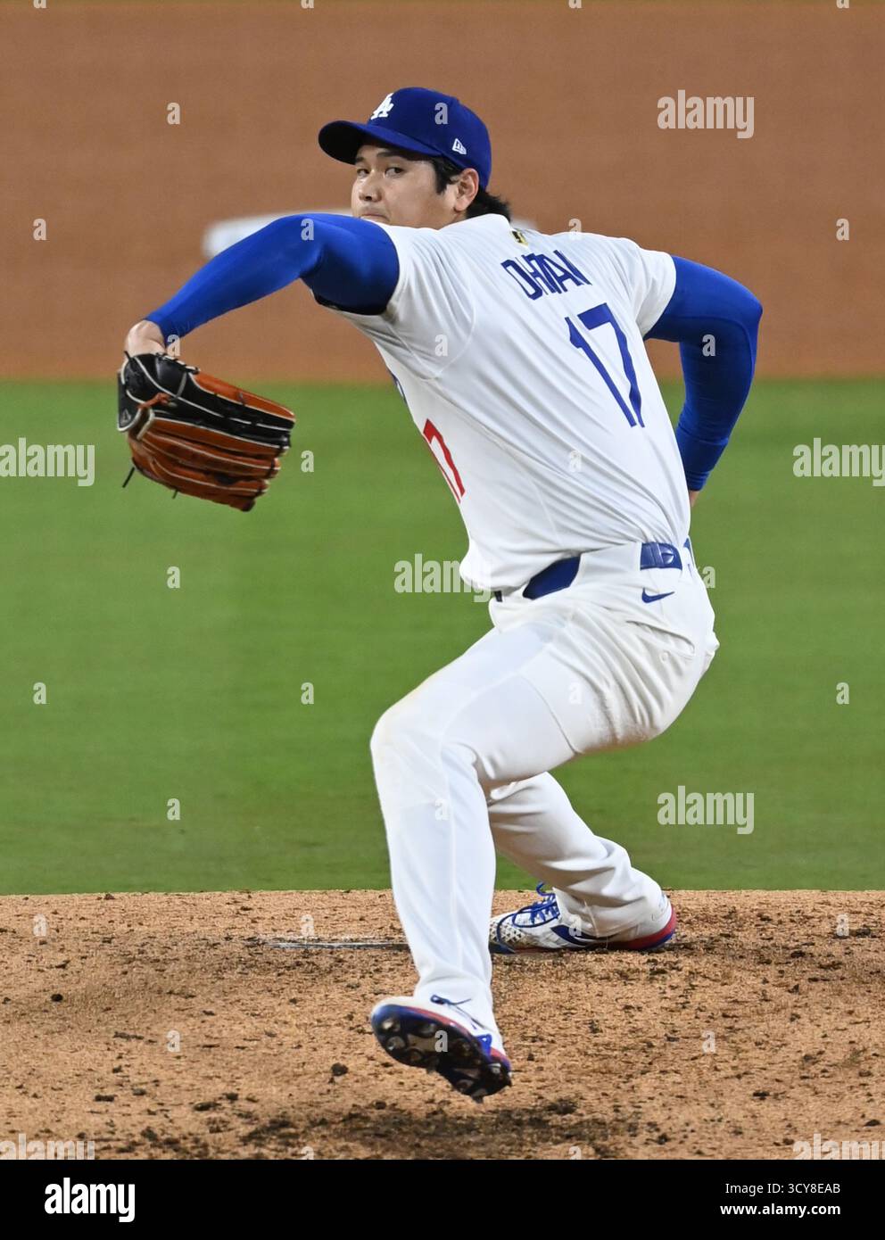 Los Angeles Dodgers starting pitcher Shohei Otani throws a pitch of ...