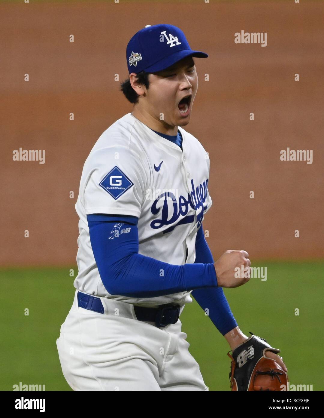 Los Angeles Dodgers starting pitcher Shohei Otani reacts after throws a ...