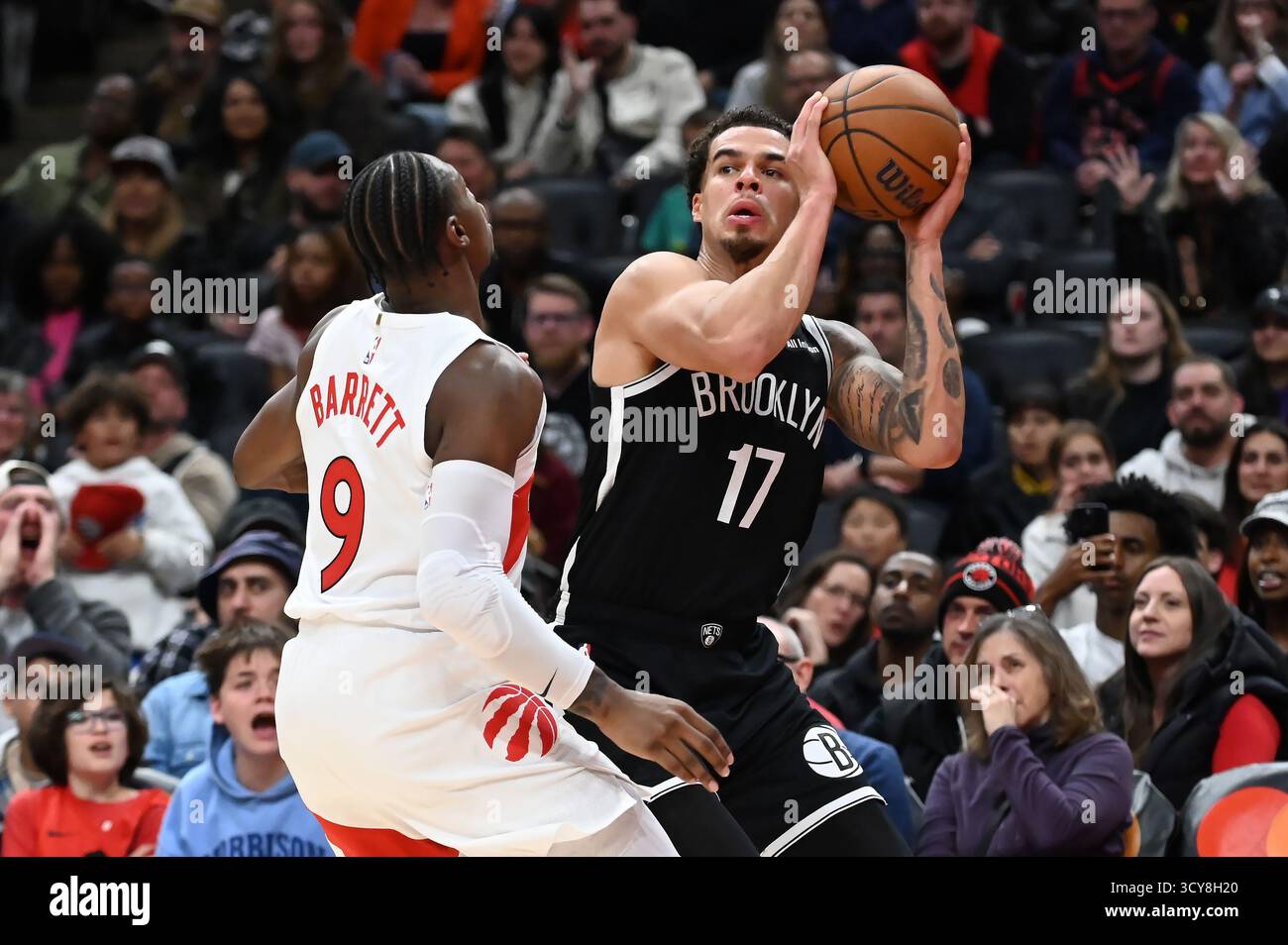 Brooklyn Nets' Michael Porter Jr. (17) protects the ball from Toronto ...