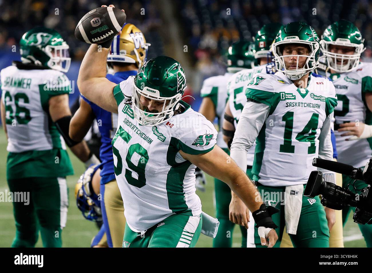 Saskatchewan Roughriders offensive lineman Braydon Noll (59) celebrates ...