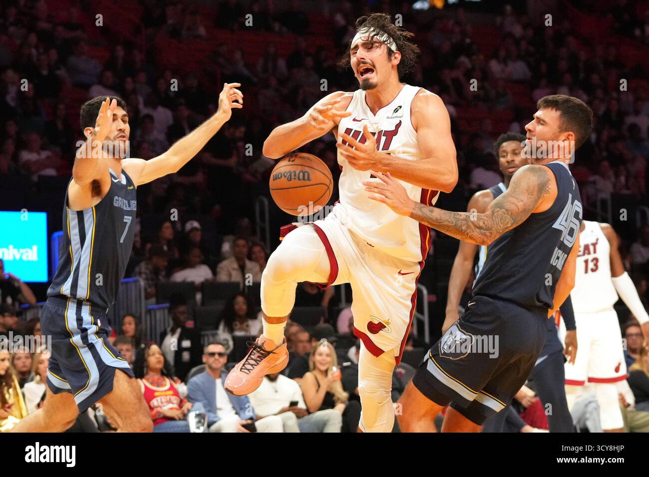 Memphis Grizzlies guard John Konchar (46) defends Miami Heat guard ...
