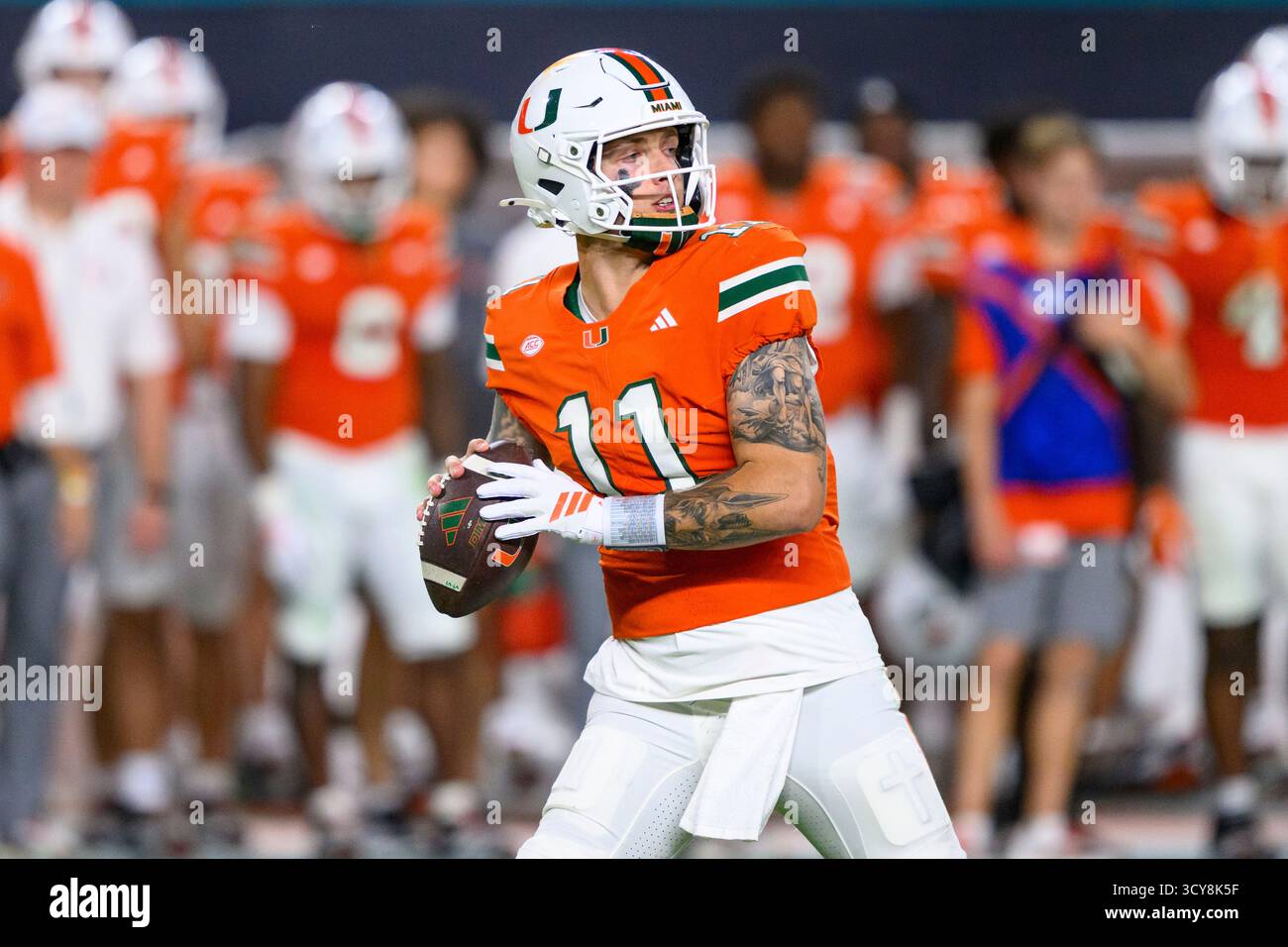 Miami quarterback Carson Beck (11) looks to throw the ball during an ...