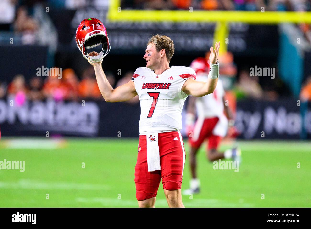 Louisville quarterback Miller Moss (7) smiles and gestures as he ...