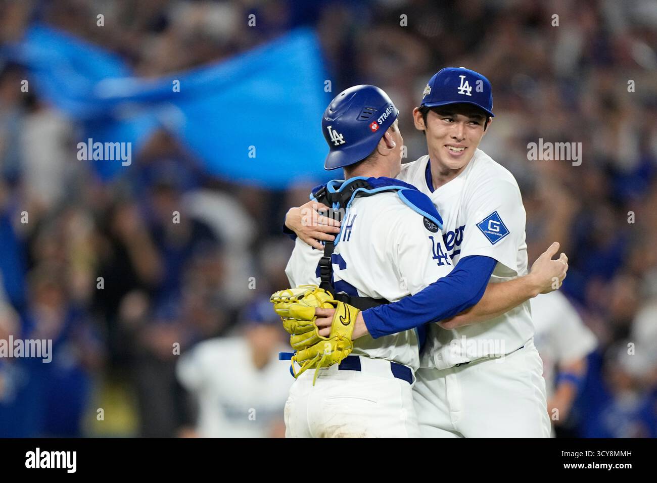 Los Angeles Dodgers pitcher Roki Sasaki and catcher Will Smith ...