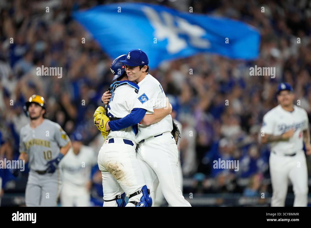 Los Angeles Dodgers pitcher Roki Sasaki and catcher Will Smith ...