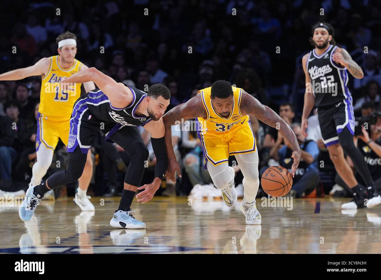 Los Angeles Lakers guard Marcus Smart (36) grabs a loose ball against ...