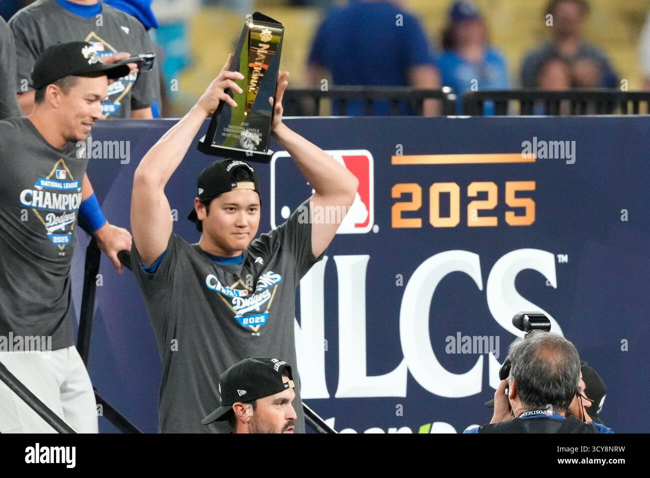 Los Angeles Dodgers' Shohei Ohtani celebrates the the trophy after ...