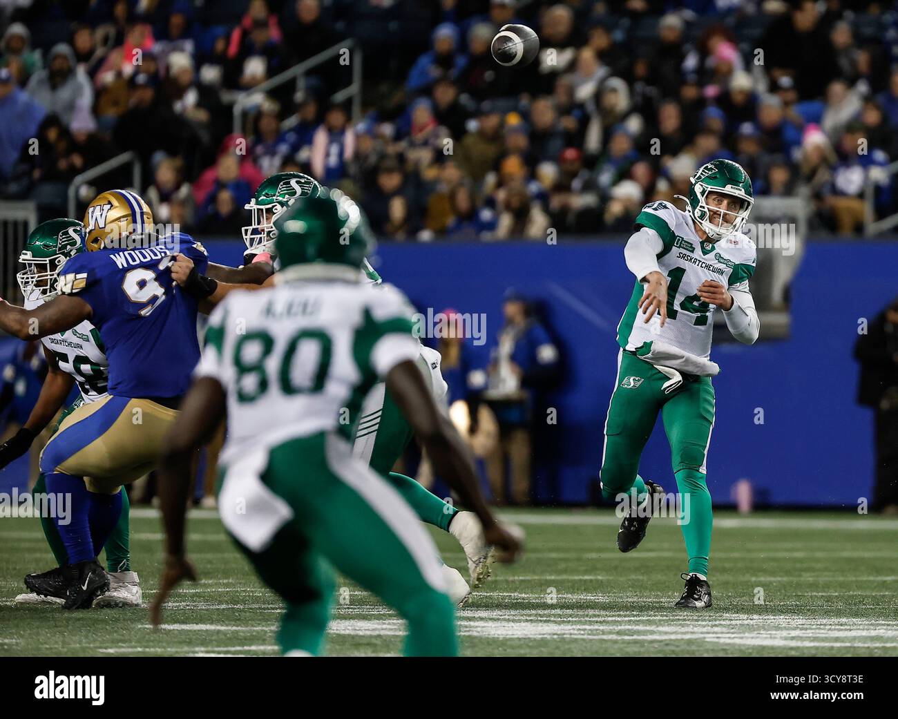Saskatchewan Roughriders quarterback Jack Coan (14) throws during ...