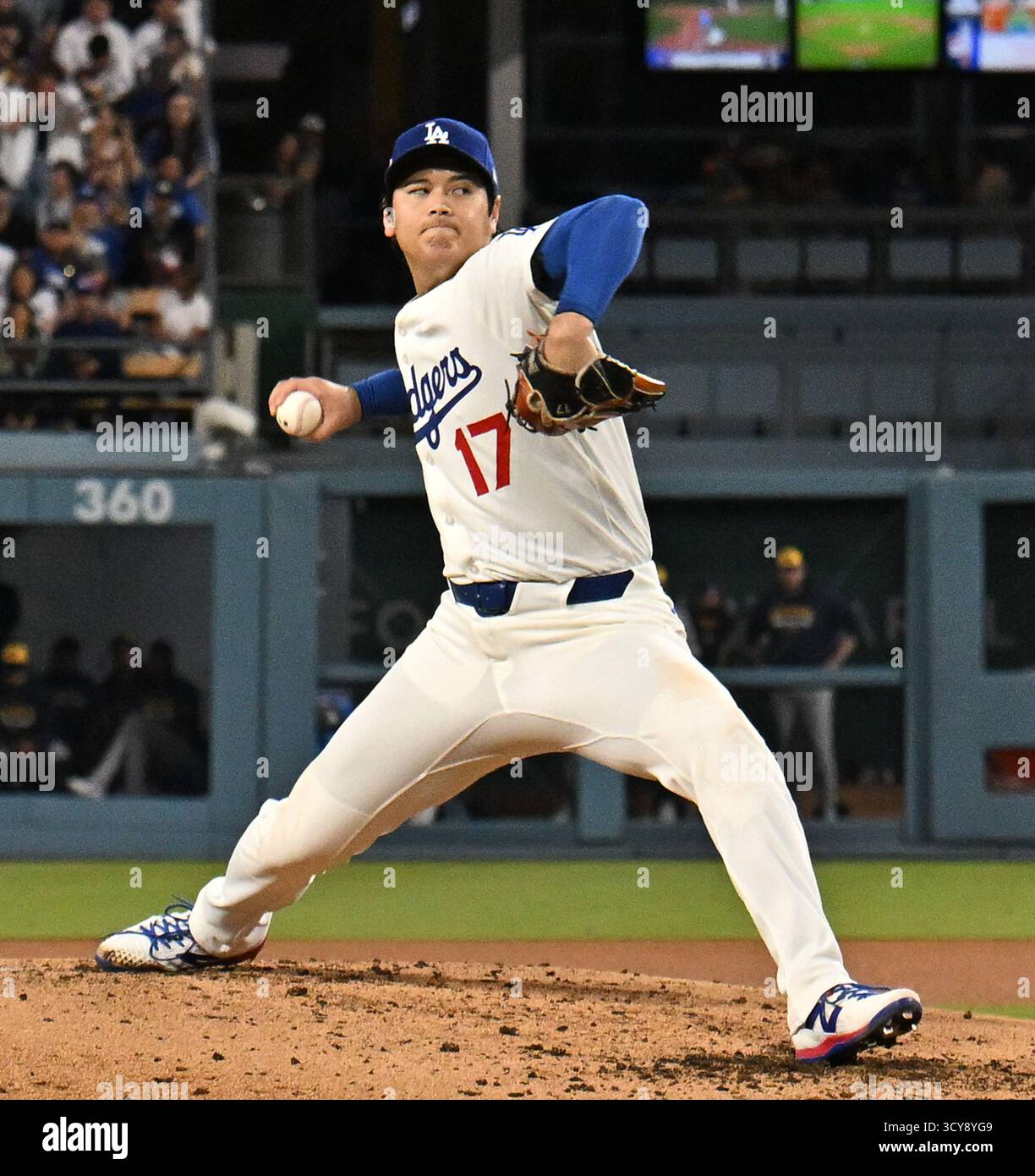 Los Angeles Dodgers starting pitcher Shohei Otani throws a pitch of ...