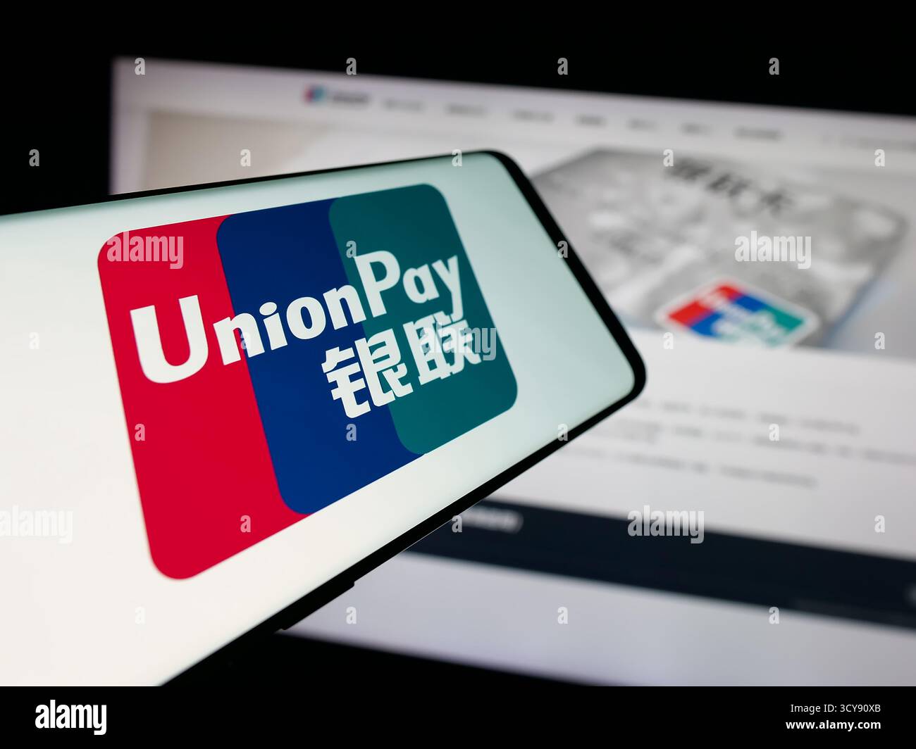 In this photo illustration, a smartphone with the logo of Chinese ...
