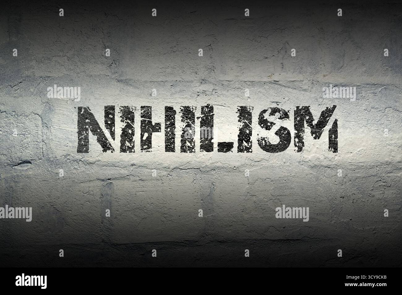 Nihilism word stencil print on the grunge white brick wall Stock Photo ...