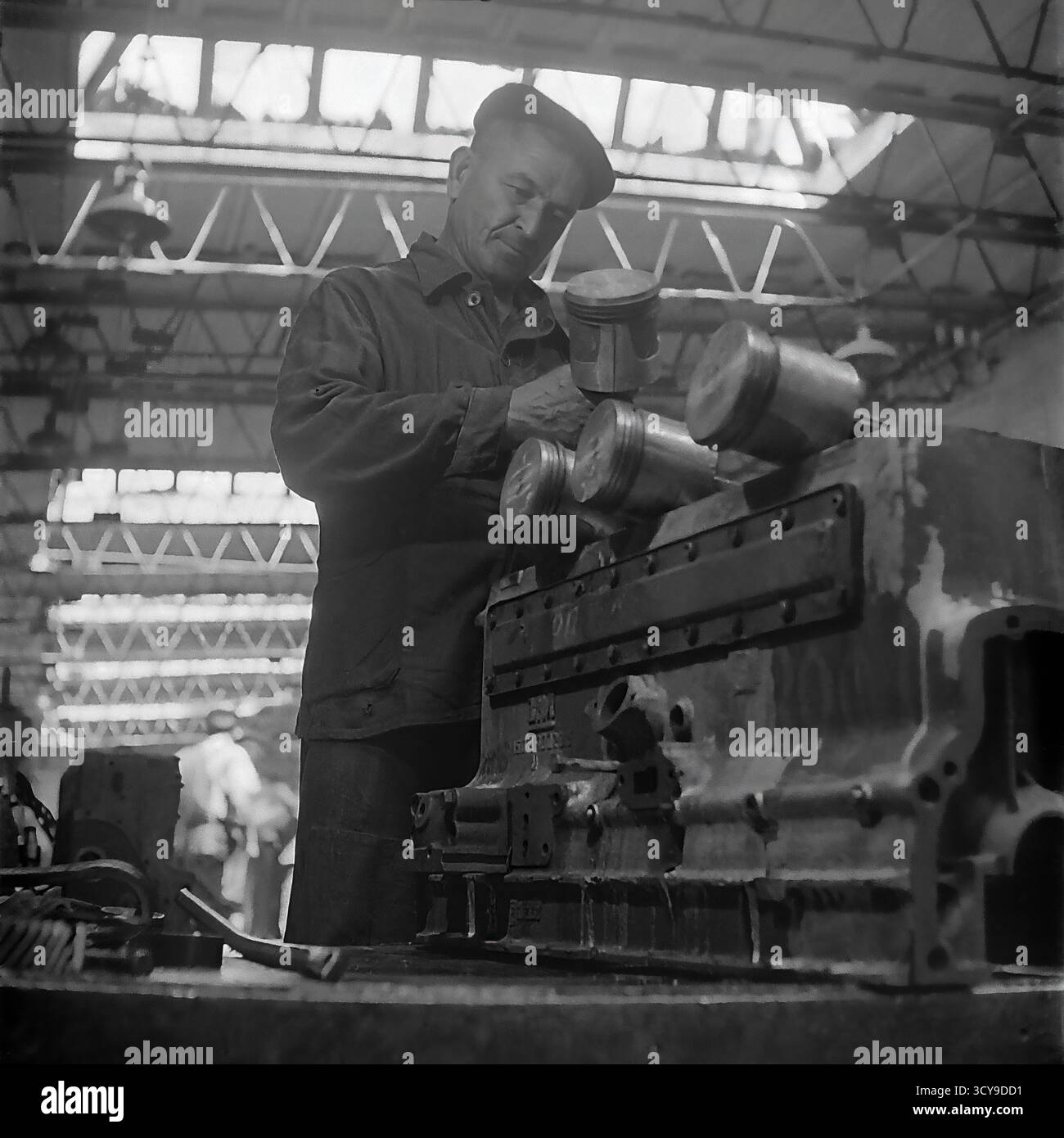 Skilled mechanic inspects large truck hi-res stock photography and ...