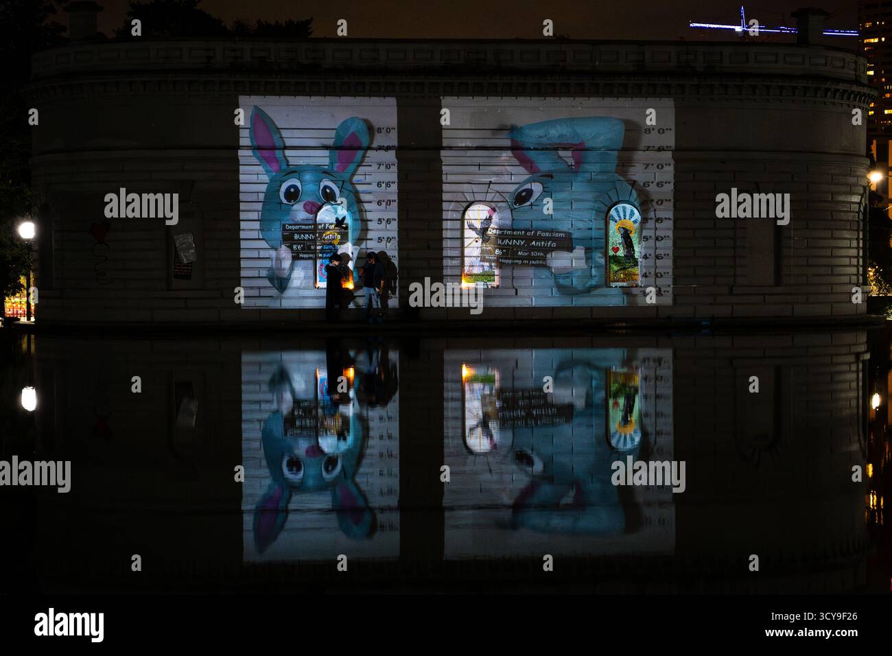 Seattle, USA. 17th Oct 2025. Late in the evening Seattle artists Light ...