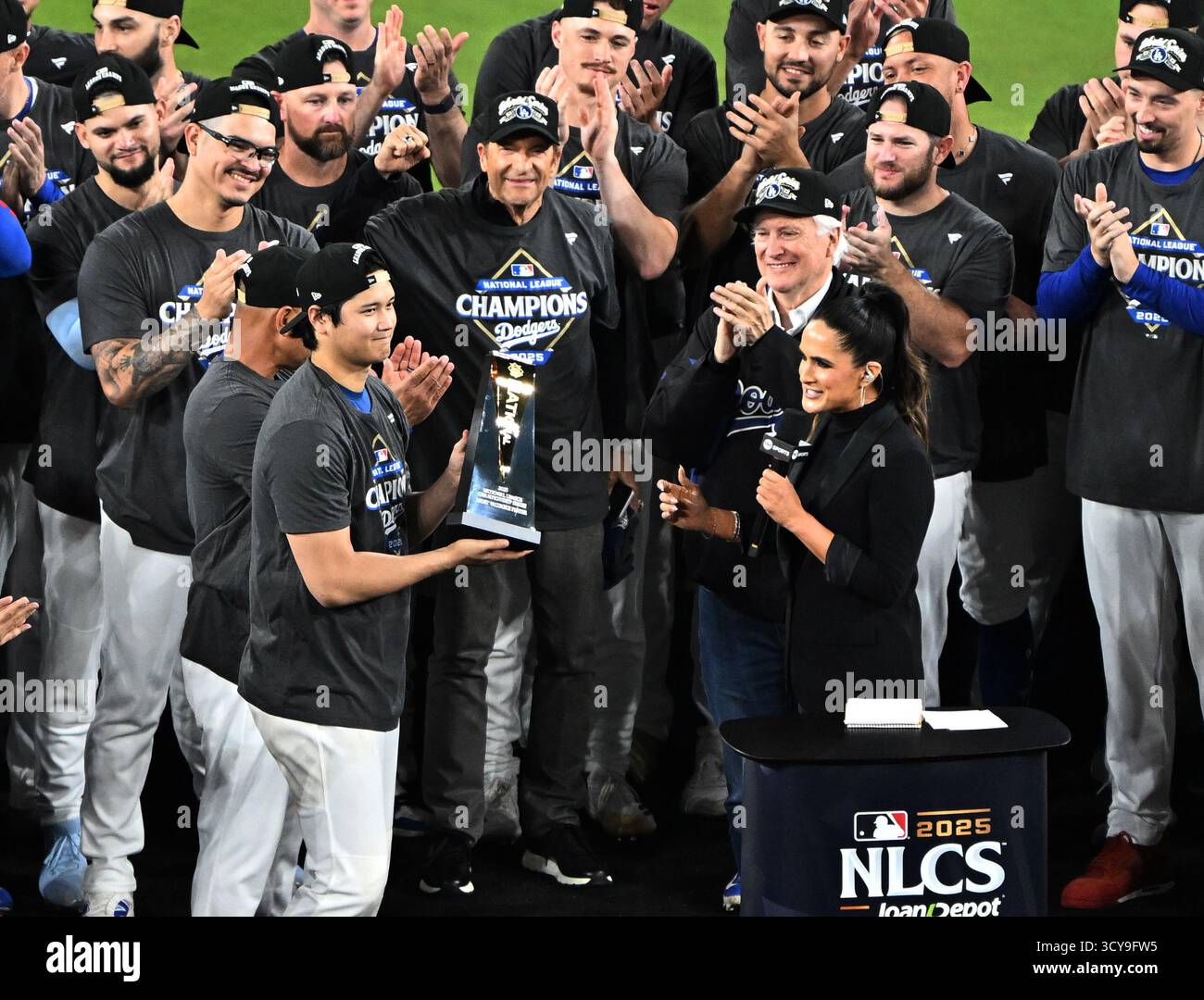 Los Angeles Dodgers' Shohei Ohtani celebrates the trophy after their ...