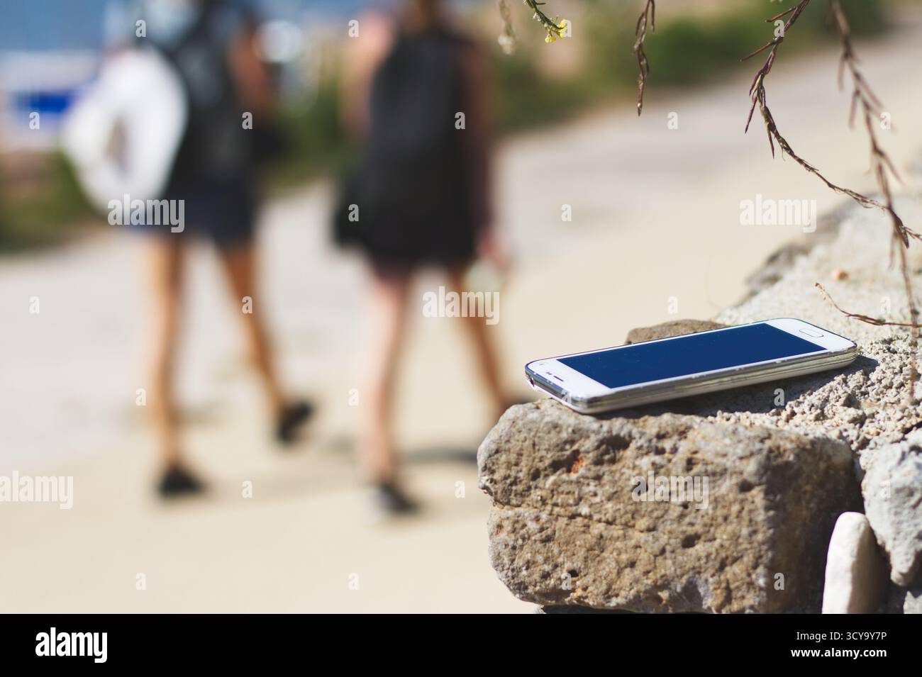 Forgotten smart phone summer hi-res stock photography and images - Alamy
