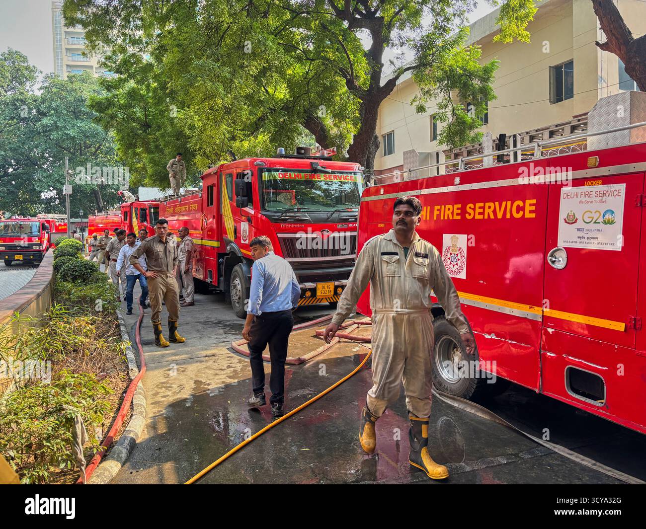 Fire officials assess the situation after dousing a fire at a ...