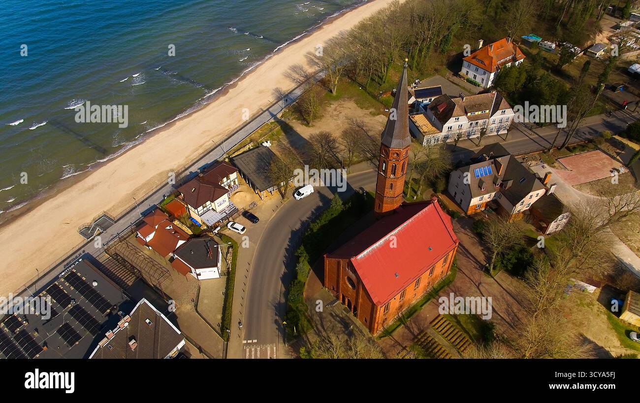 Beautiful aerial perspective of Sarbinowo’s beach, calm Baltic Sea, and ...