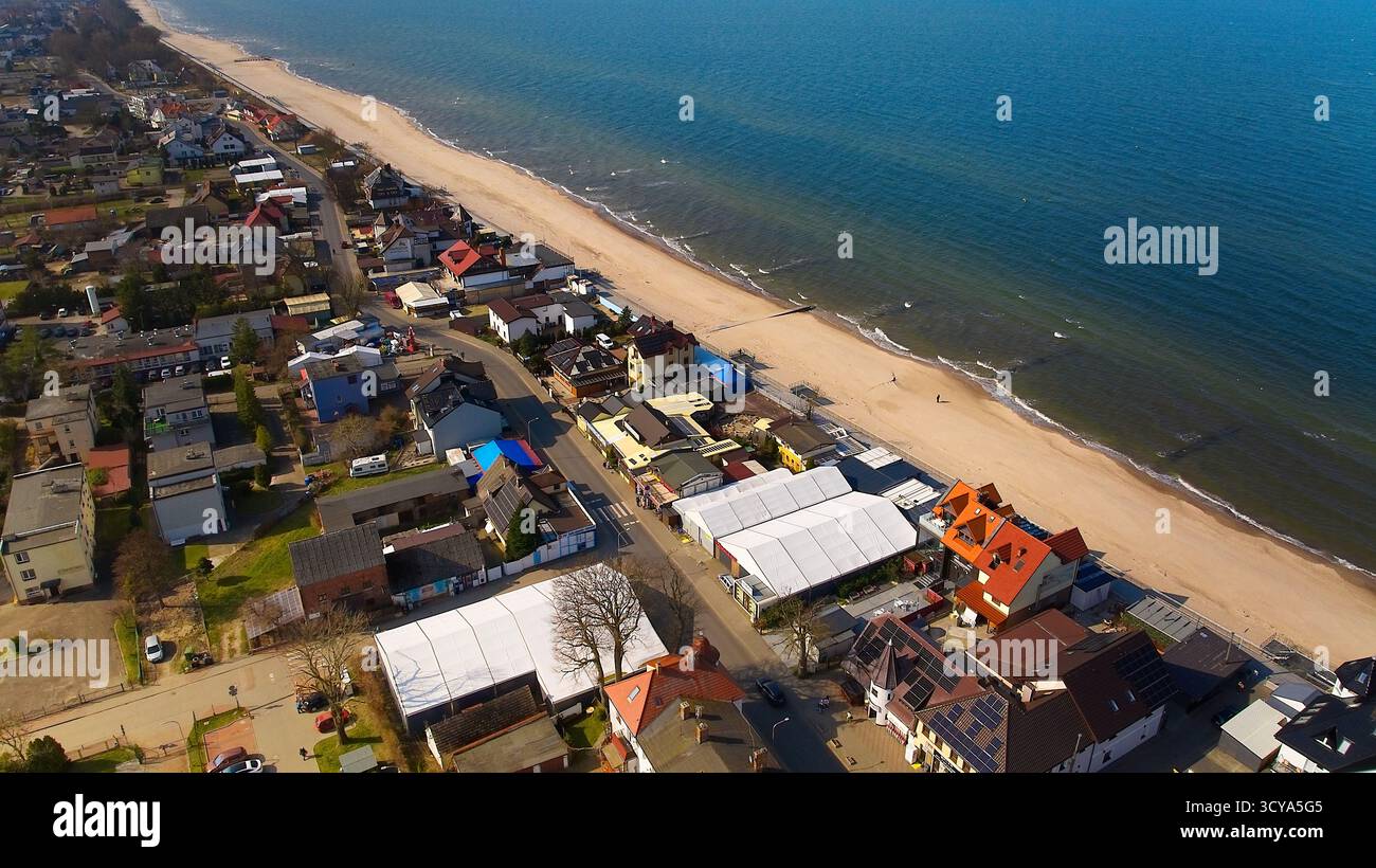 Aerial capture of Sarbinowo’s beach and sea, calm spring tones and ...