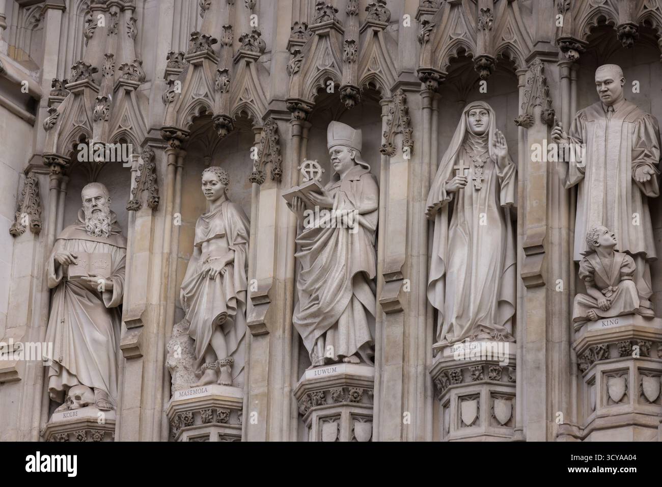London, UK. 16th Oct, 2025. Modern martyrs' statues stand in niches ...