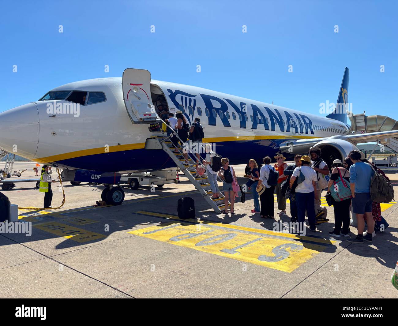Passengers boarding a Ryanair aircraft Stock Photo - Alamy
