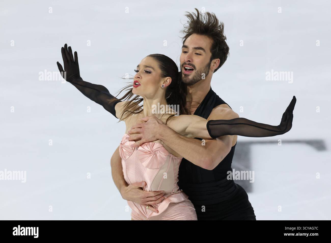 Laurence FOURNIER BEAUDRY and Guillaume CIZERON of France perform ...