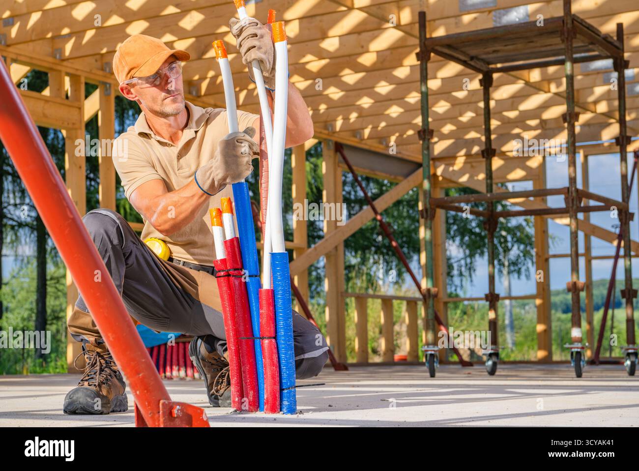 Skilled worker carefully positions hi-res stock photography and images ...