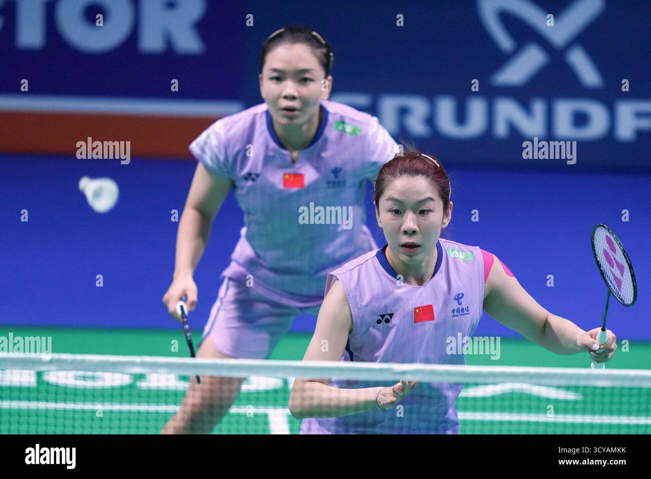 China's Chen Qing Yong, rear, and Jia Yi Fan in action during the women ...