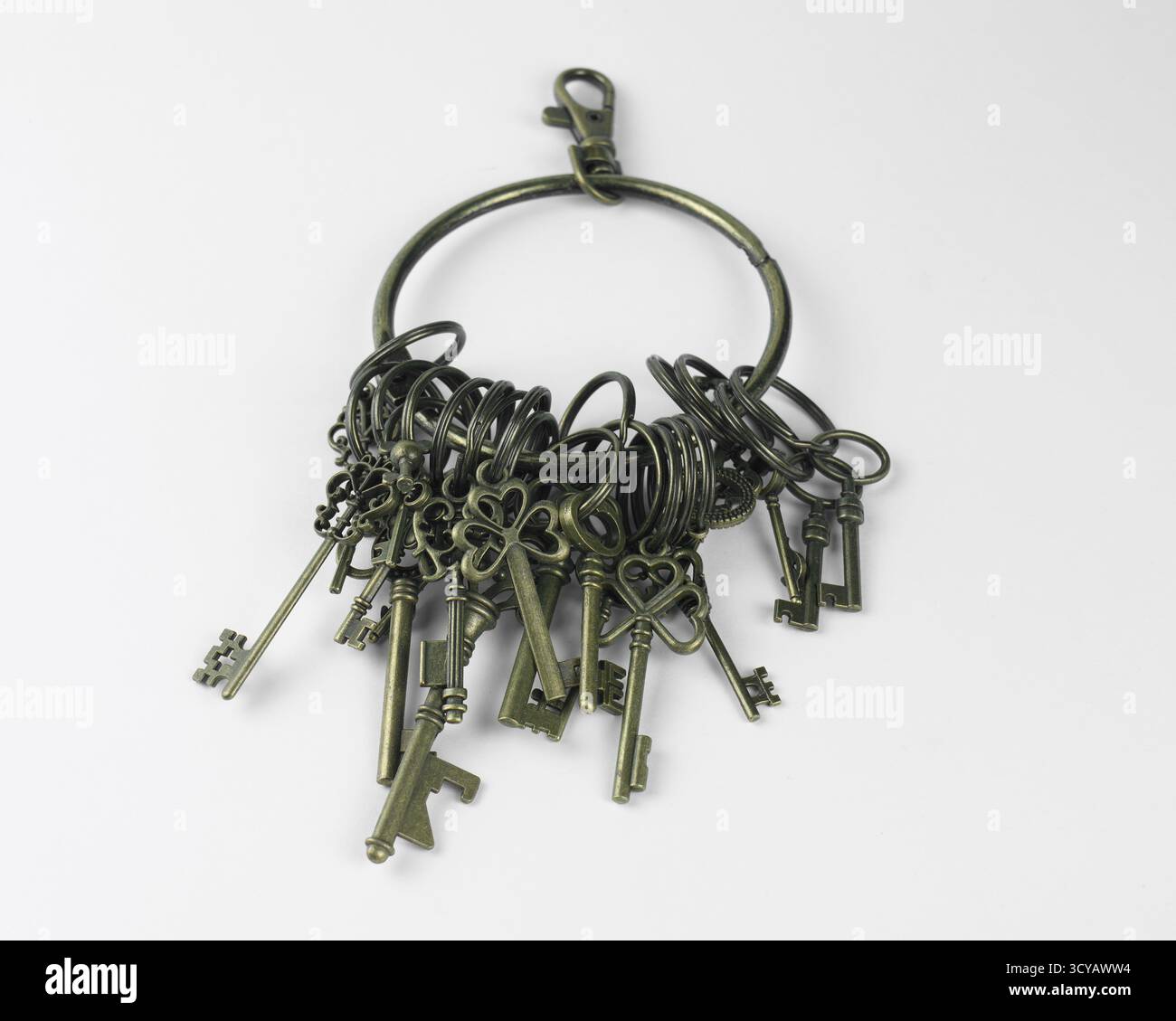 Vintage keys on a keyring with unique designs Stock Photo - Alamy