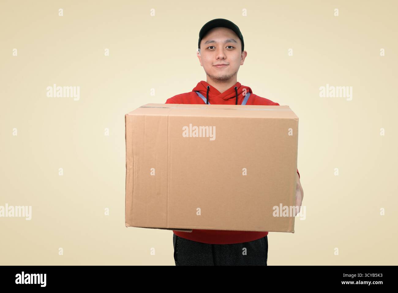 Person in red hoodie hi-res stock photography and images - Alamy