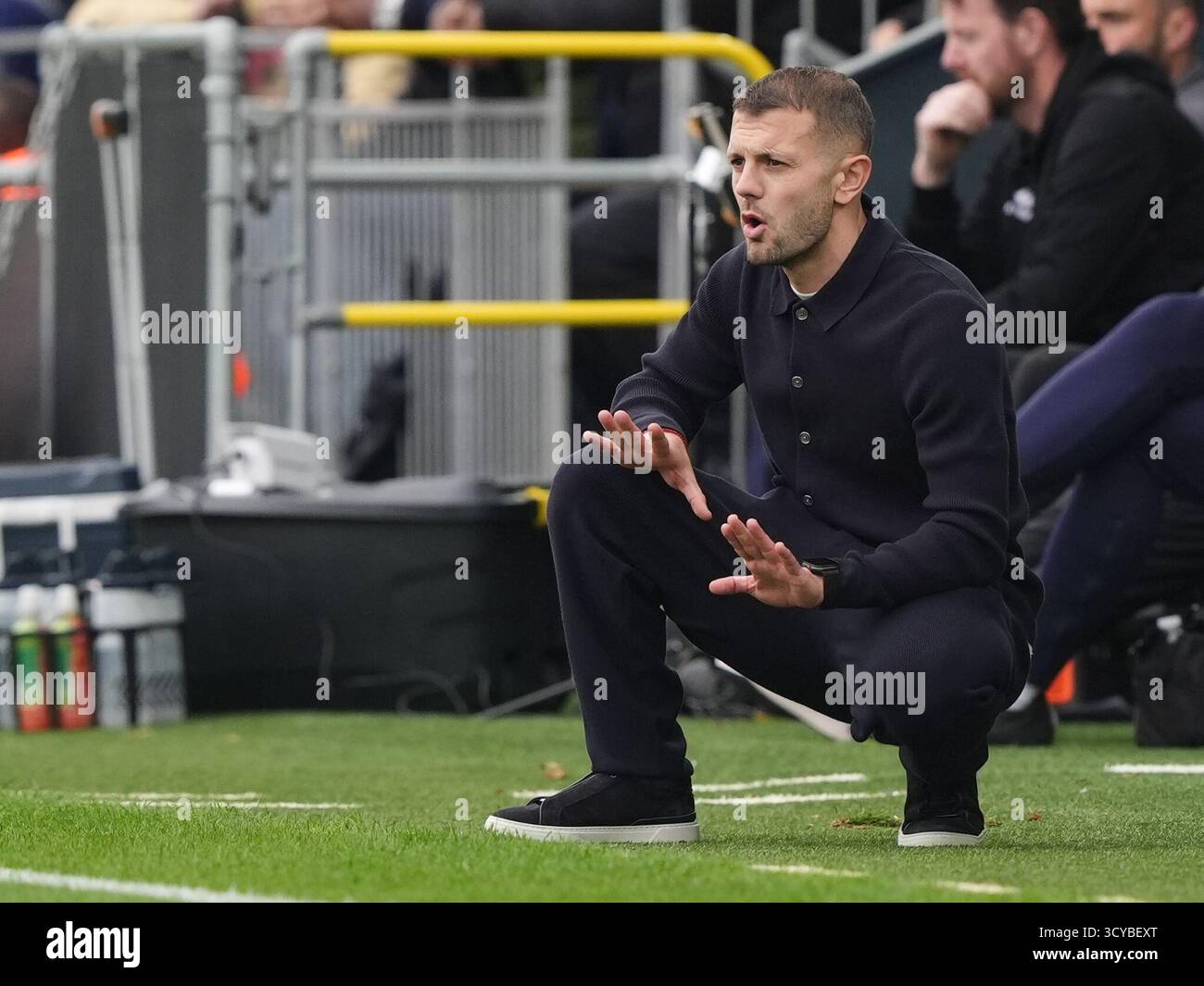 Luton Town manager Jack Wilshere (left) on the touchline during the Sky ...