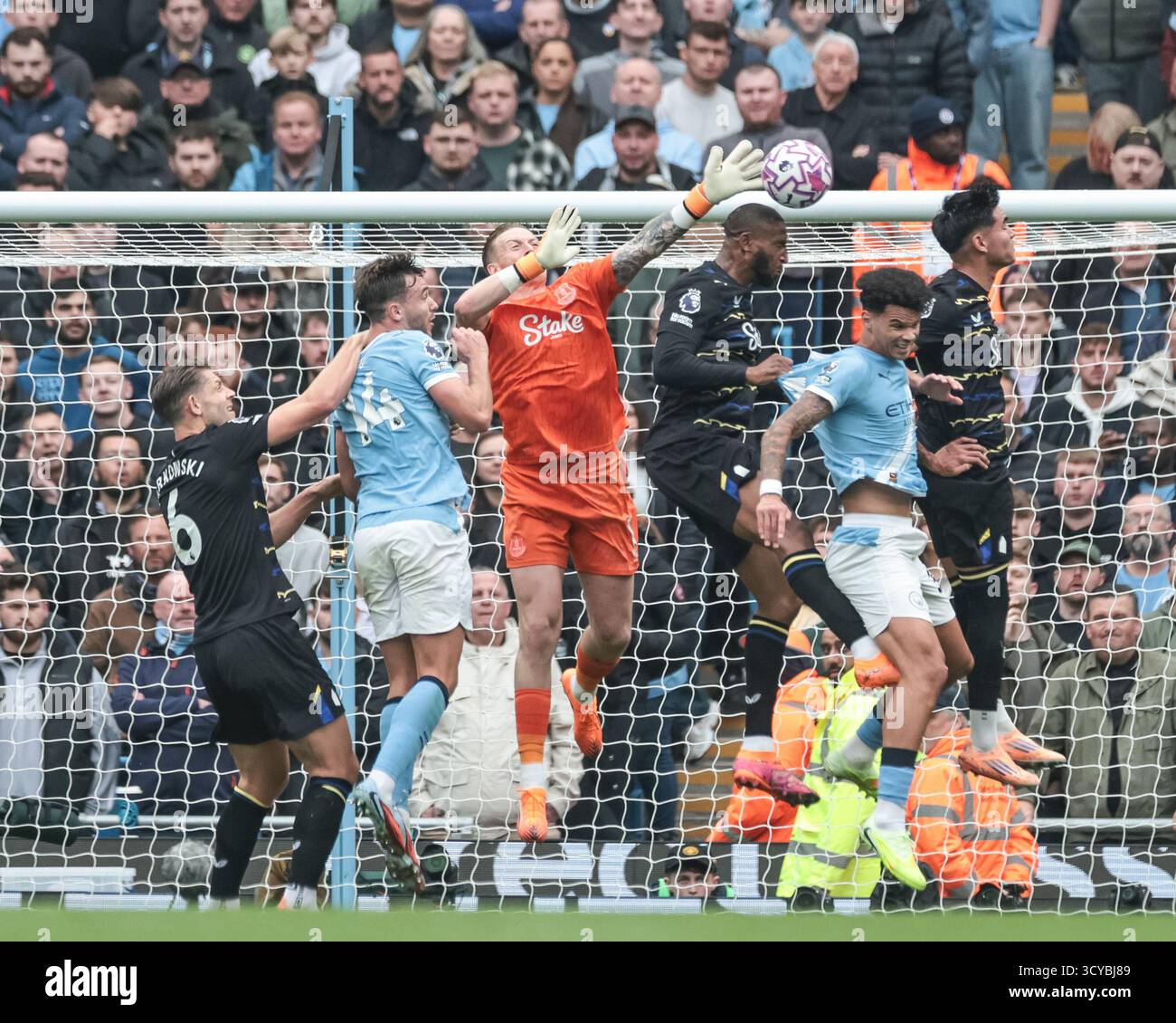 Everton goalkeeper Jordan Pickford makes a fingertip save during the ...
