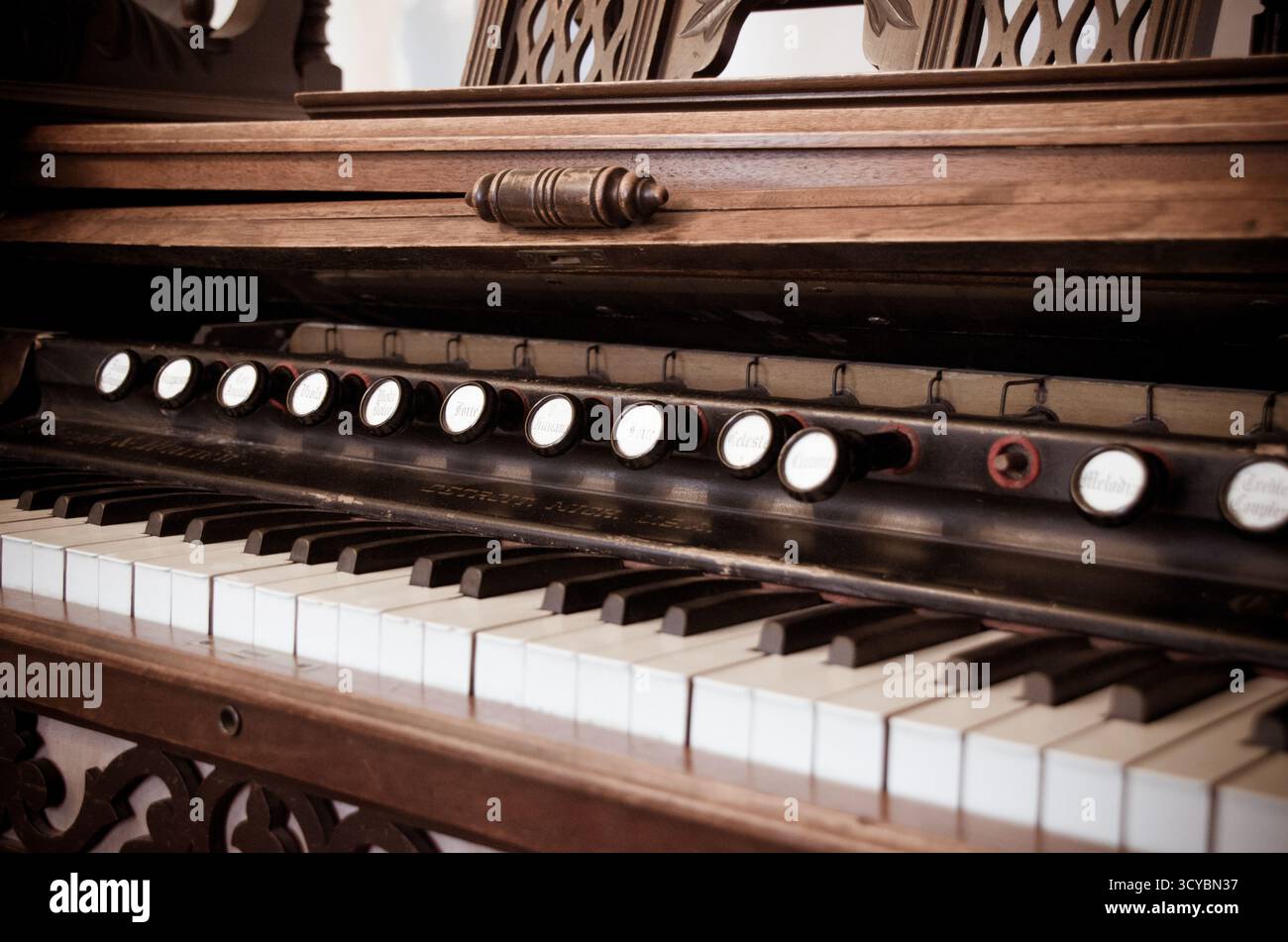 Close up of old broken dusty piano keys. Music playing from the ancient ...