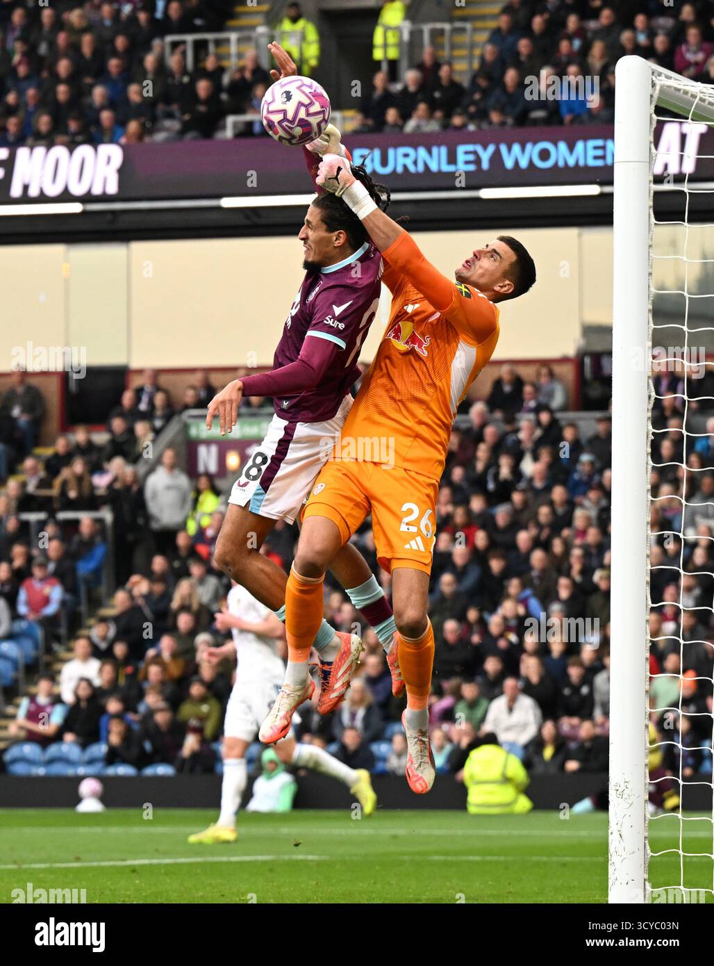 Burnley's Hannibal Mejbri collides with Leeds United goalkeeper Karl ...