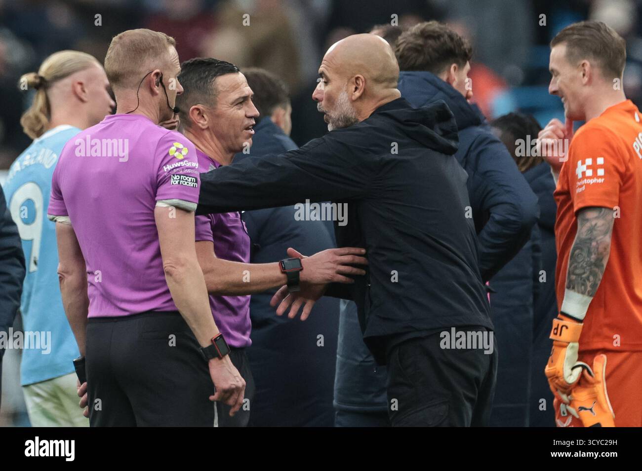 Pep Guardiola manager of Manchester City speaks with referee Tony ...