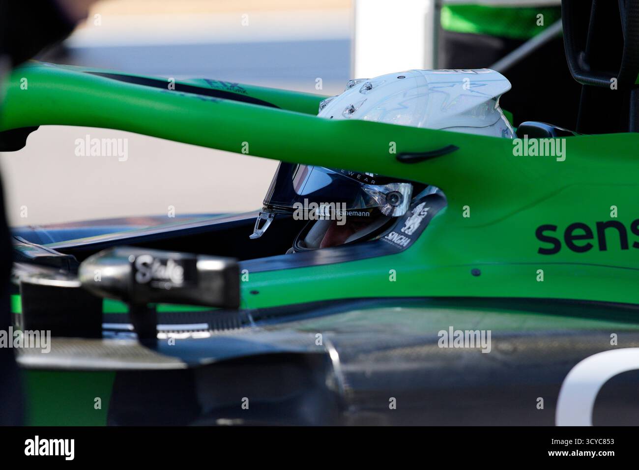Kick Sauber driver Nico Hulkenberg of Germany sits in his car before ...