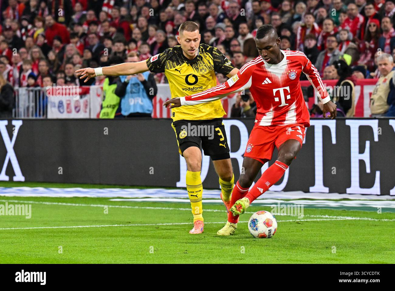 MUNICH, GERMANY - Waldemar ANTON (Borussia Dortmund 3) against Nicolas ...