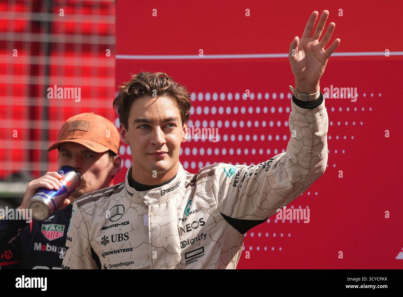 Mercedes driver George Russell of Britain celebrates his second place ...