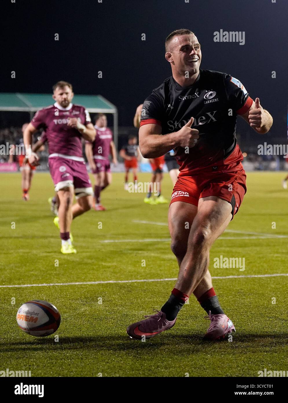 Saracens' Ben Earl (right) celebrates after scoring a try during the ...