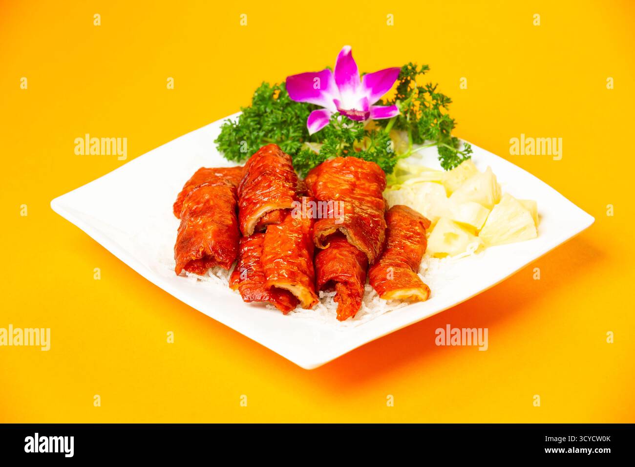 Crispy Fried Intestines Roll with rice and vegetable served in plate ...